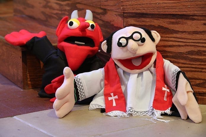 Preaching to his youngest parishioners with helping hands - Georgia ...