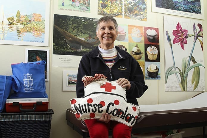 IHM school nurse dispenses kindness - Georgia Bulletin - Georgia Bulletin